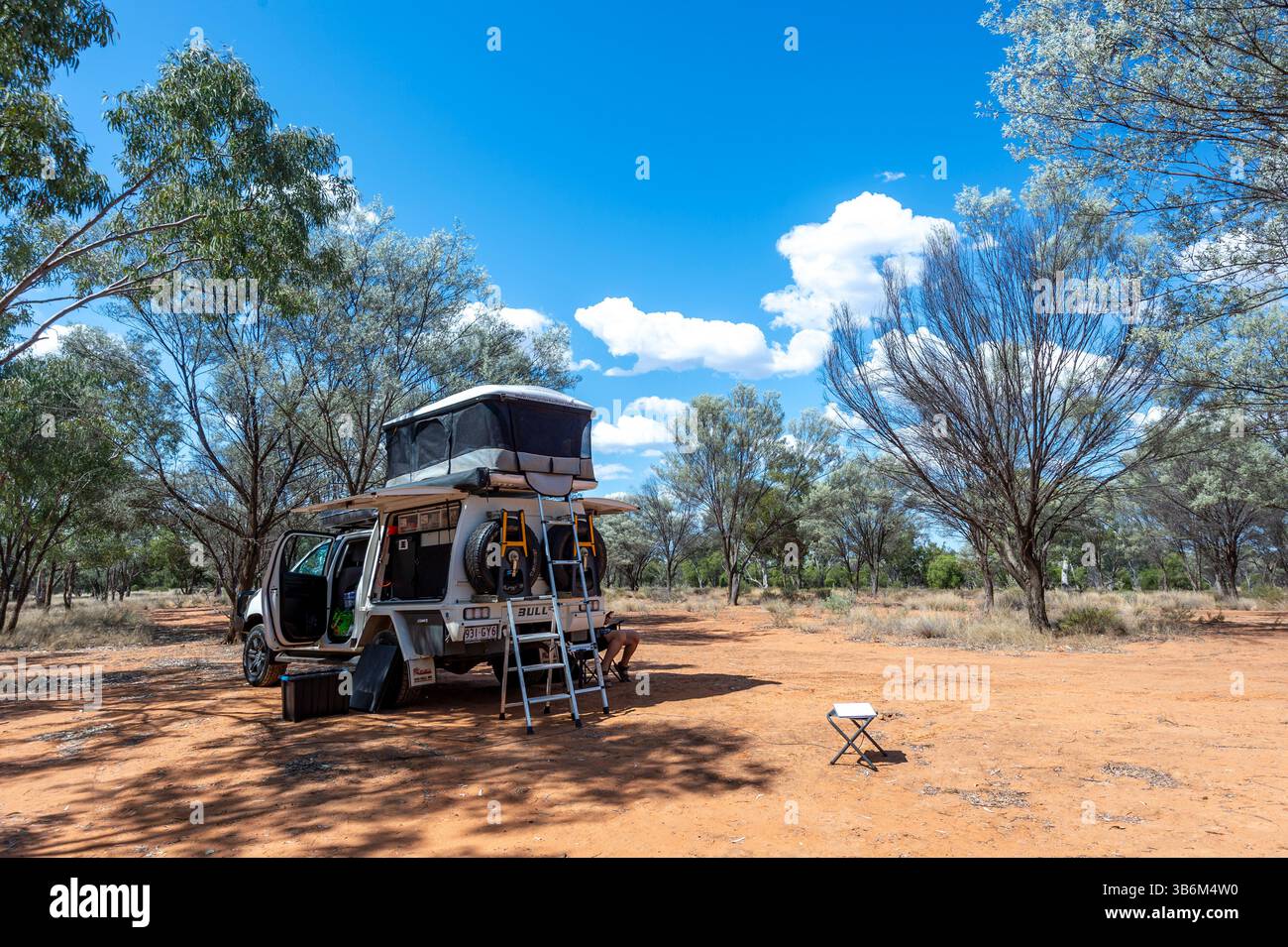 Converted ute with a roof top tent and Starlink satellite dish camping ...