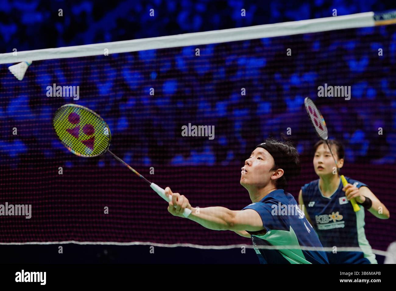 South Korea's Seo Seung-Jae, foreground, returns a shot next to his ...
