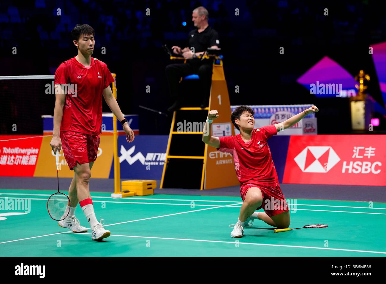 China's Huang Dong Ping, right, celebrates with her teammate Feng Yan ...