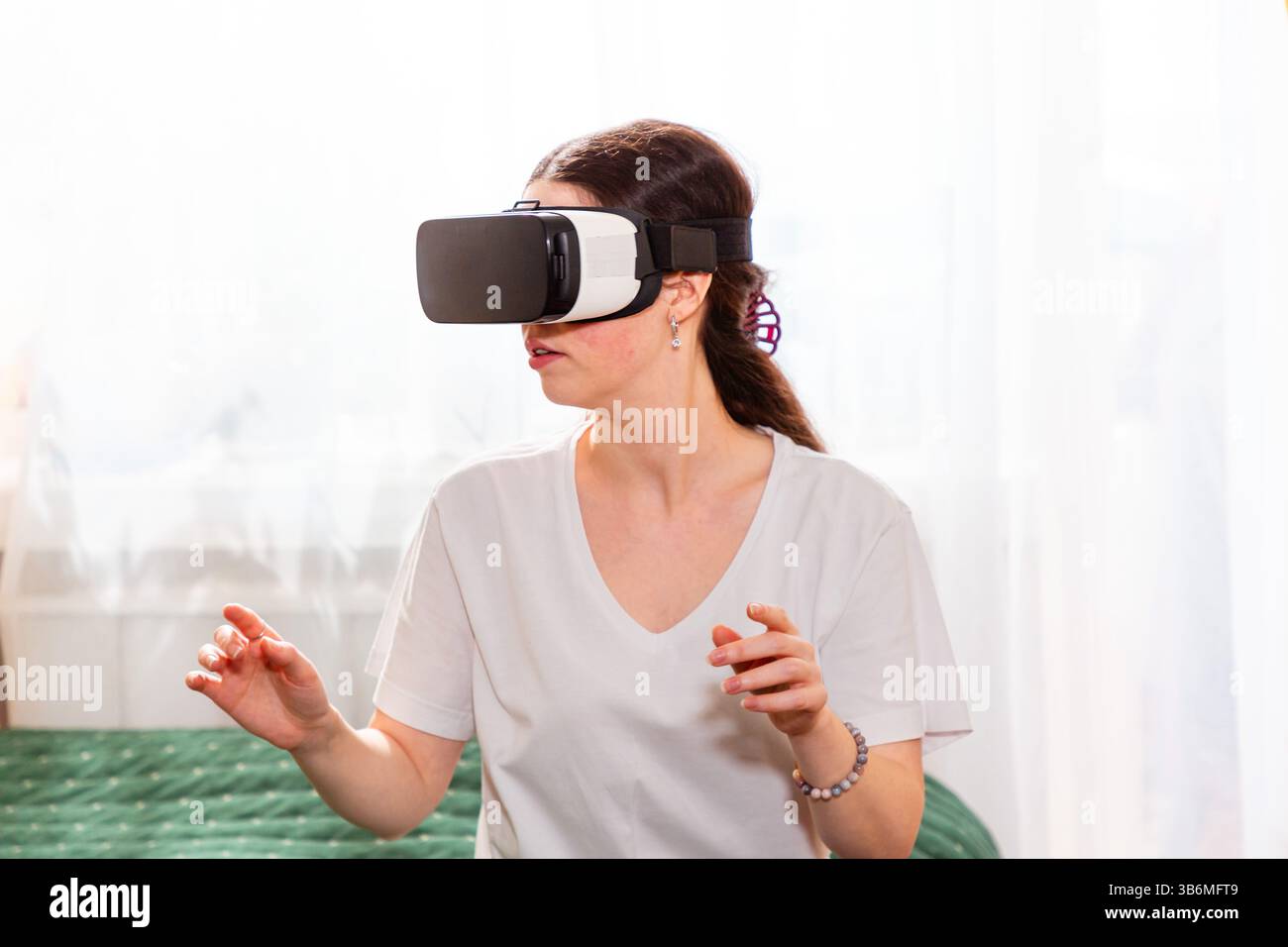 Woman stepping vr headset in hi-res stock photography and images - Alamy