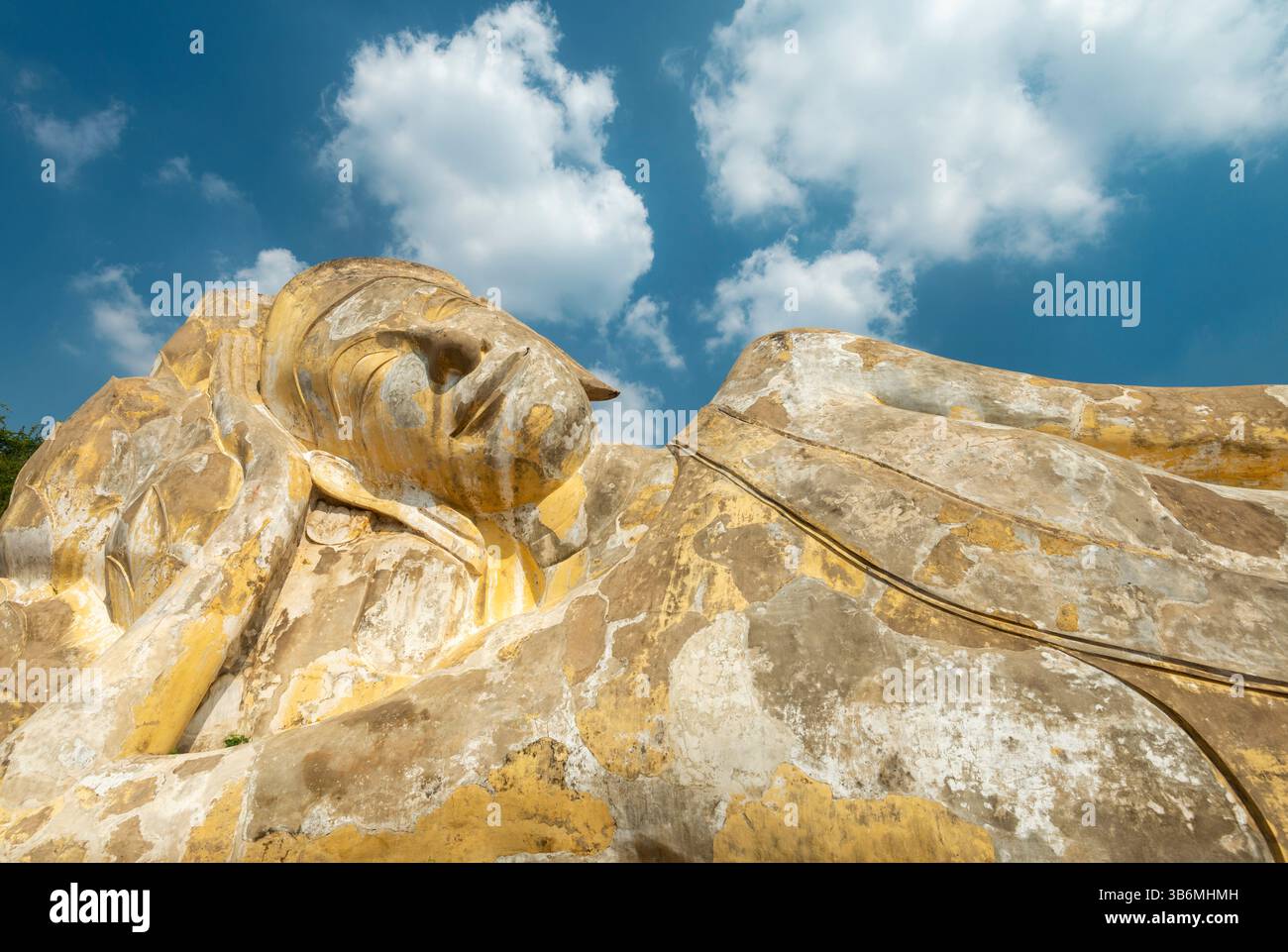 Laying in repose in the afternoon sun,the huge,8 metres high stone ...