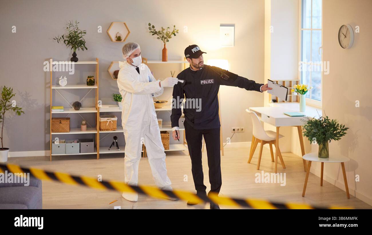 Forensic uniform hi-res stock photography and images - Alamy