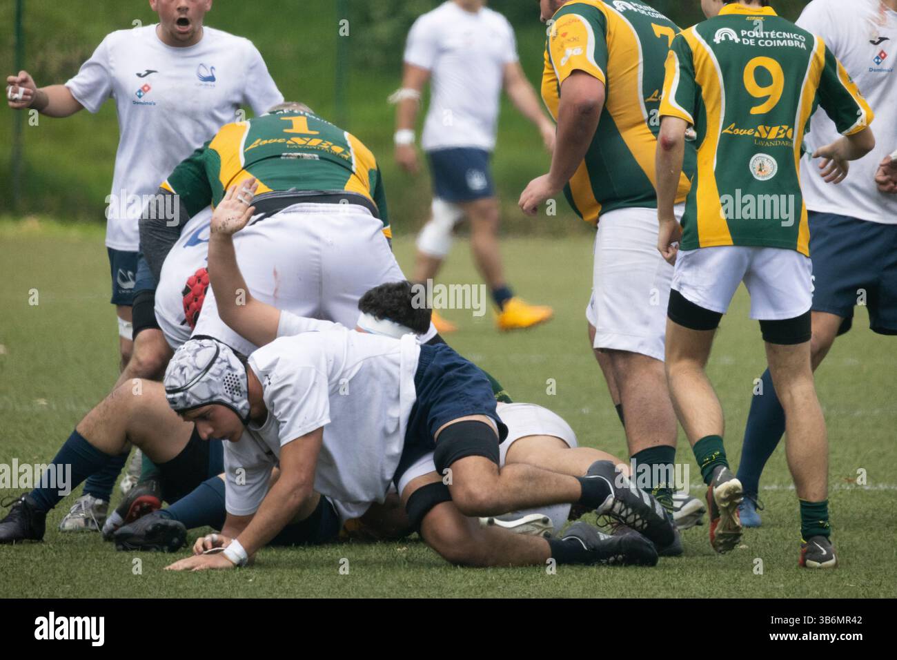 3 may 2025, lisbon. Portugal - oeiras vs ag - rugby players competing during a ruck on field ...