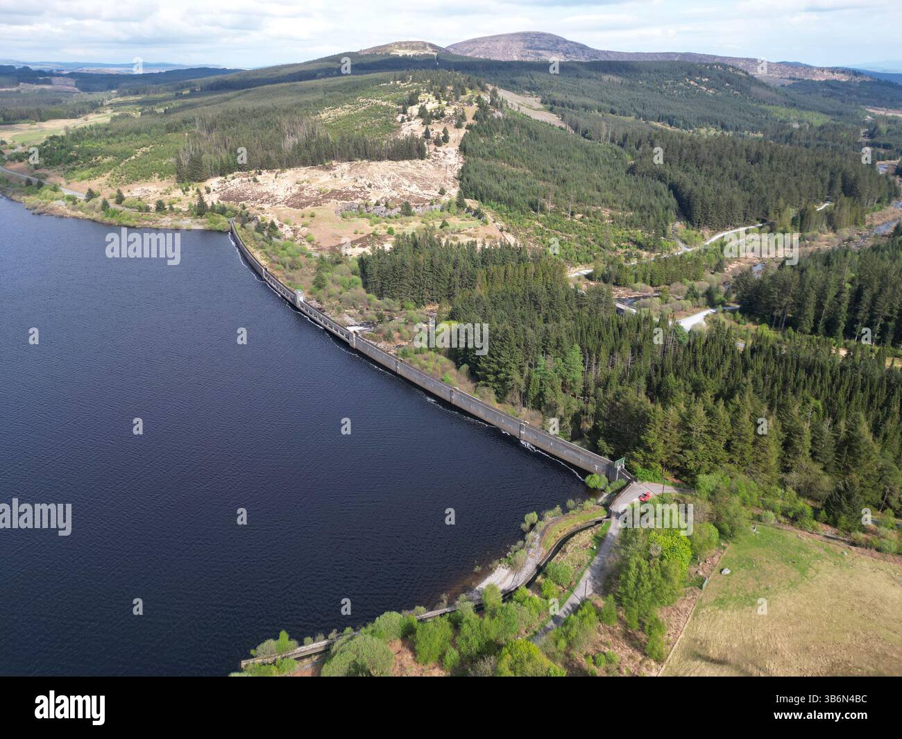 Aerial view of Clatteringshaws Dam and Loch Dee built in the 1930s to ...