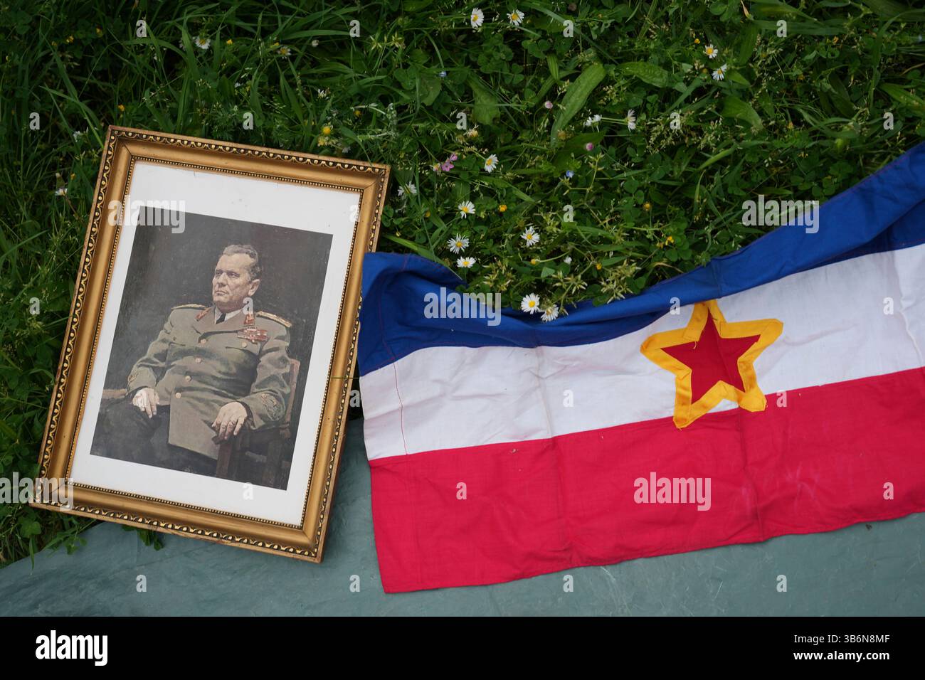 A street vendor sells a picture of the late Yugoslav communist ...