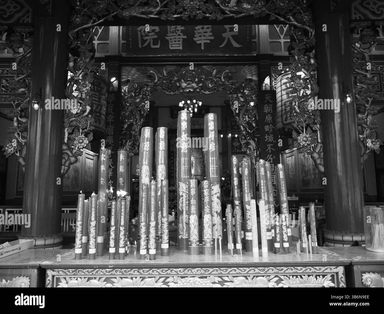 The Kuan Im Shrine in Bangkok's Chinatown. Incense sticks are taken out ...