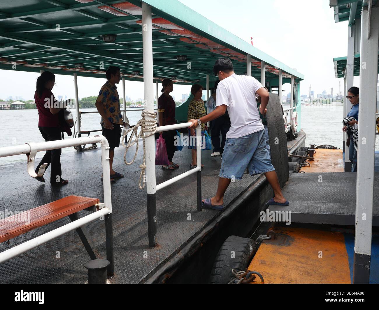 A Chao Phraya River ferry boat connecting Wat Bang Na Nok Pier on the ...