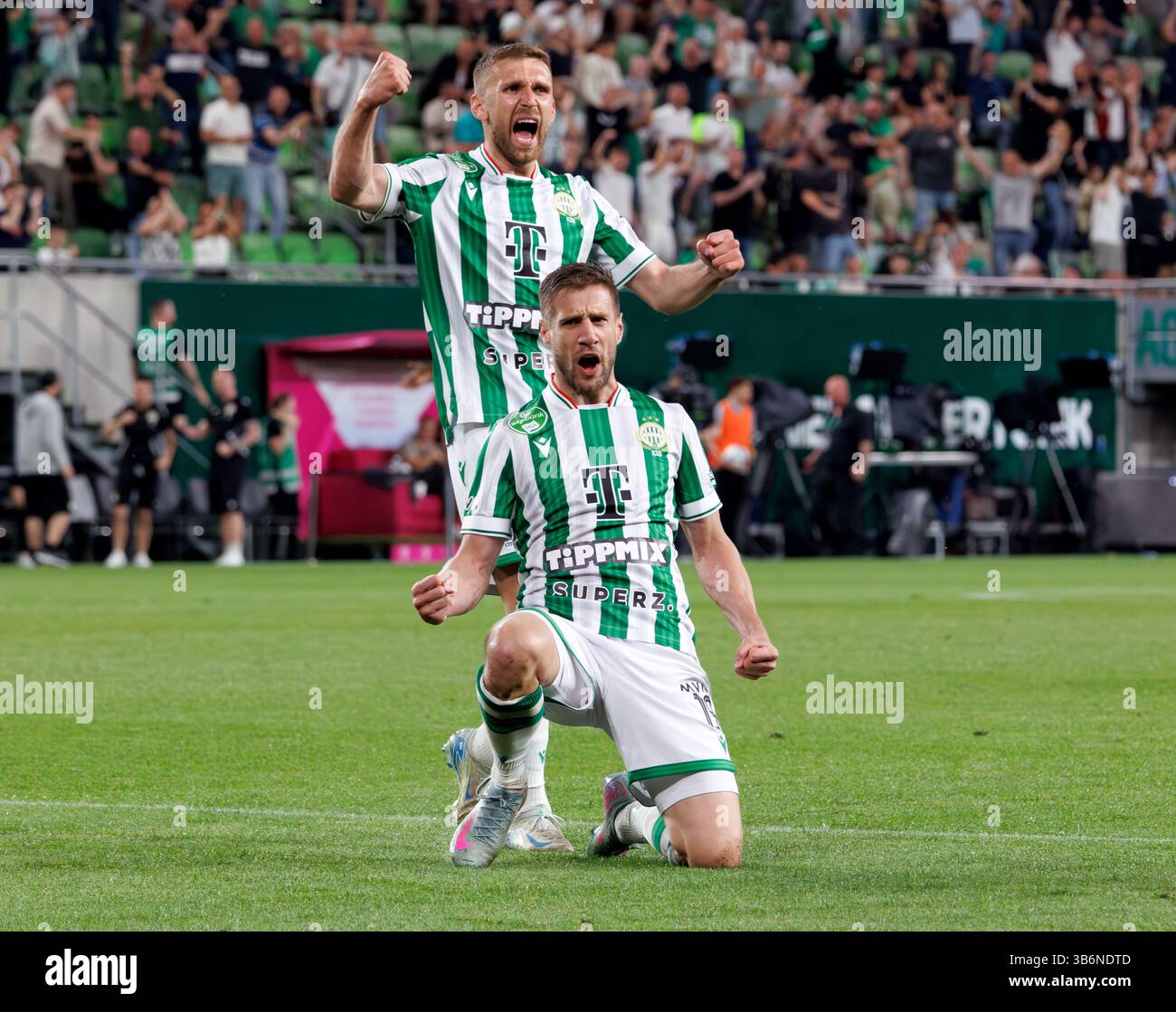 Budapest, Hungary. 3rd May, 2025. Barnabas Varga of Ferencvarosi TC (r ...