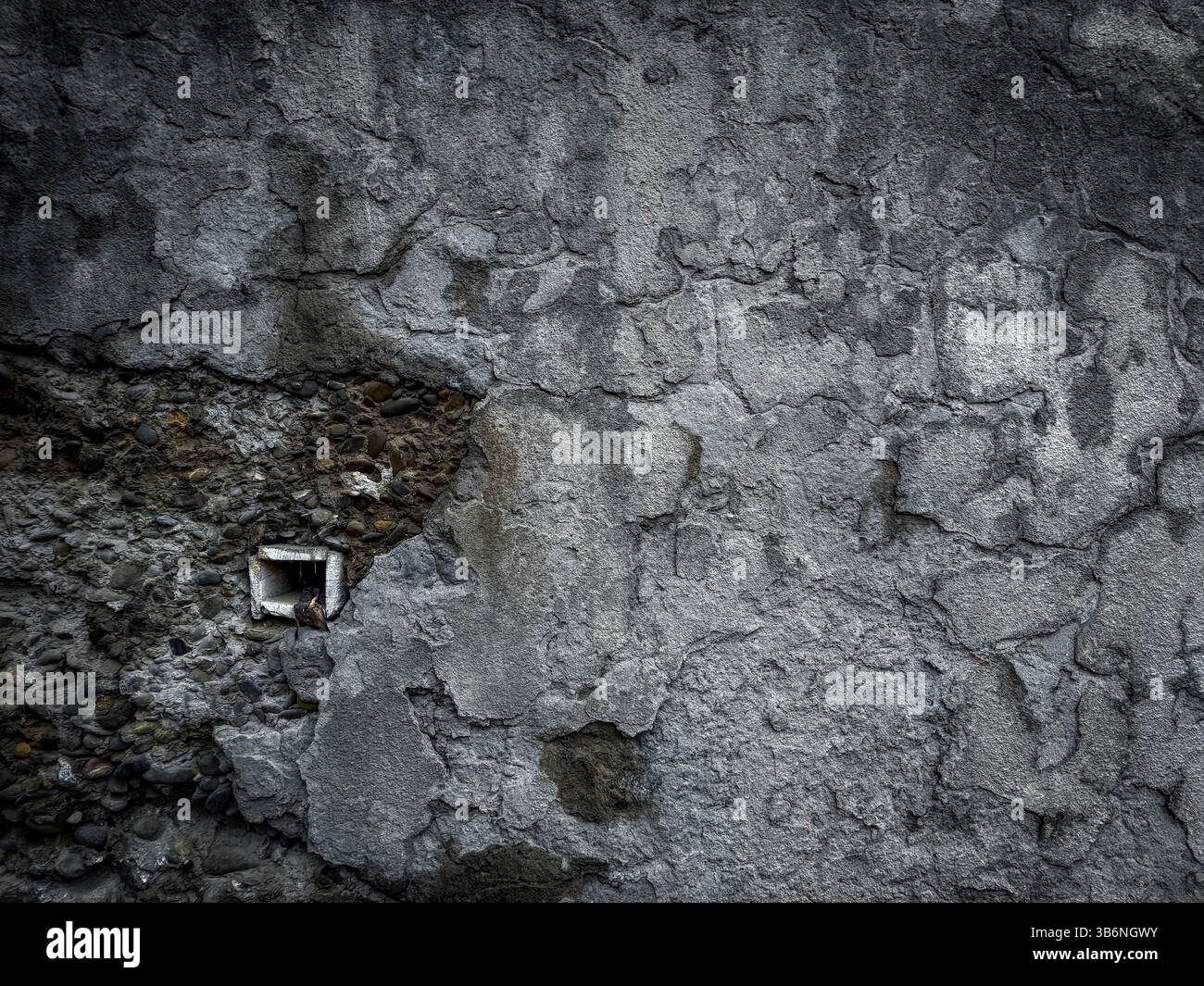 Damaged cement wall with exposed hole and rugged texture, featuring ...