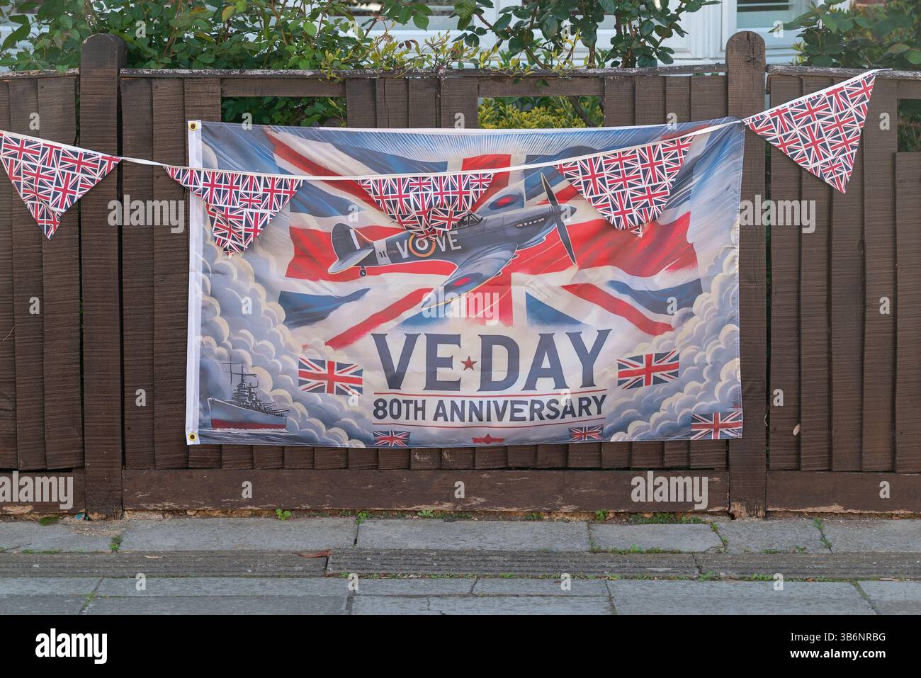 Union Jack flag with details of the 80th anniversary of the VE day ...