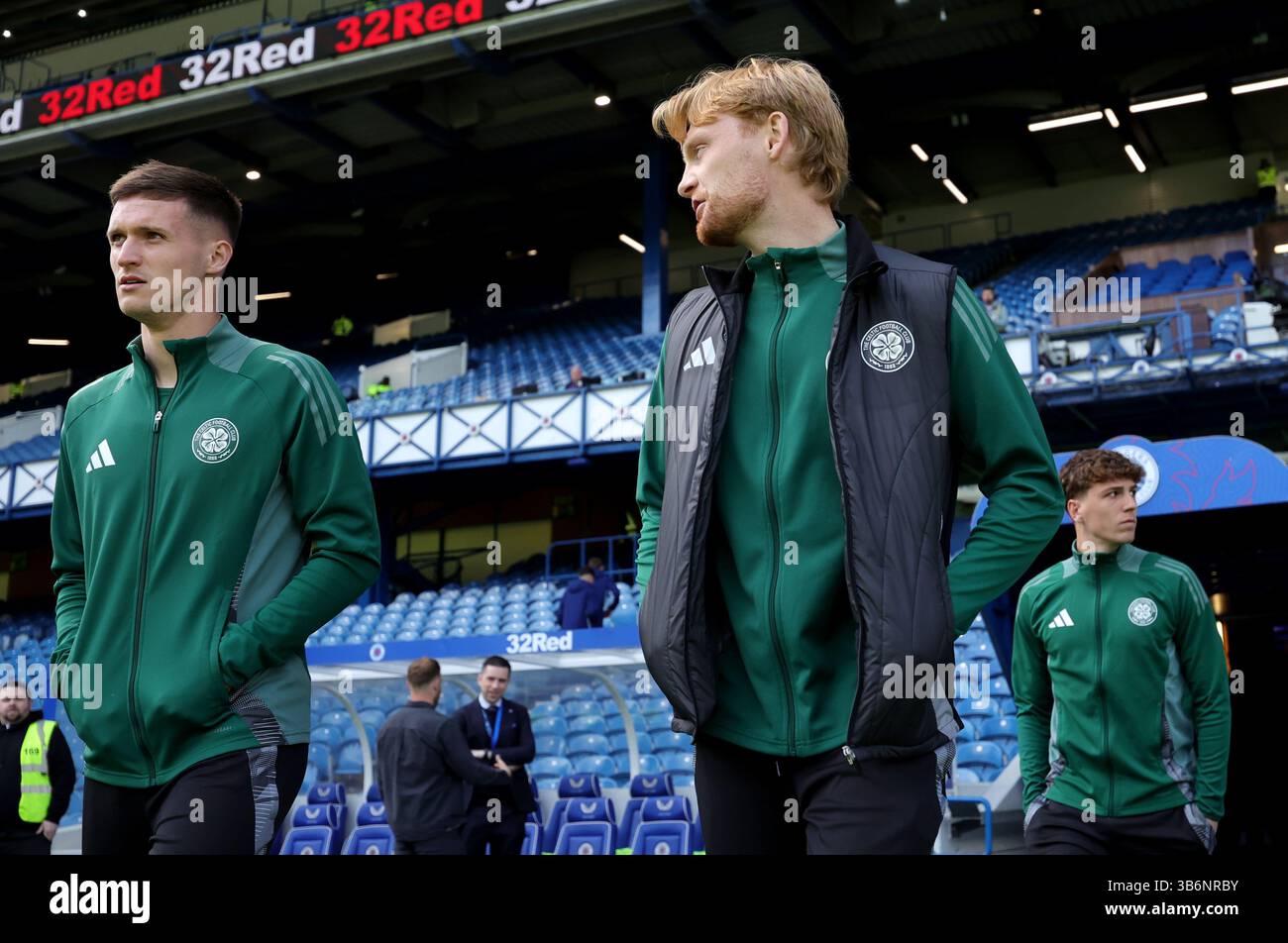 Celtic's Johnny Kenny (left) and Liam Scales walk out onto the pitch ...