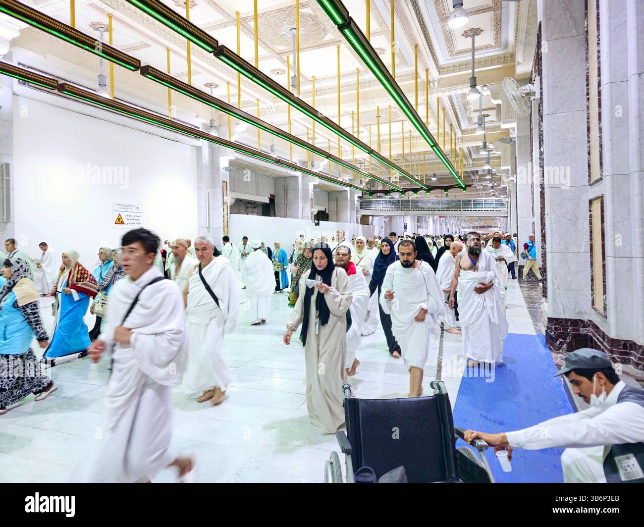 Mecca, Saudi Arabia, June 8 2024: Muslims travel back and forth between ...