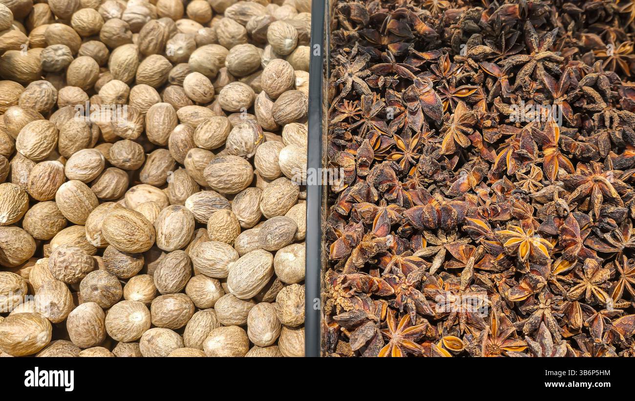 Nutmeg and anise lie on the counter in the supermarket. Prepared for ...