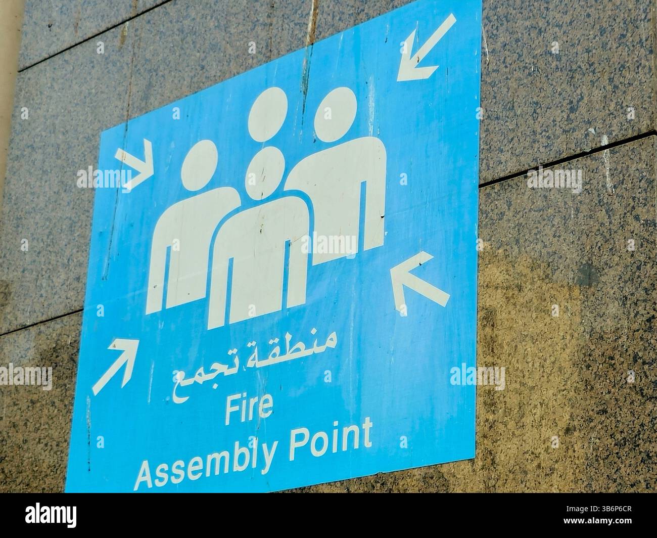 Translation of the Arabic text (Fire assembly point), Next to the great ...