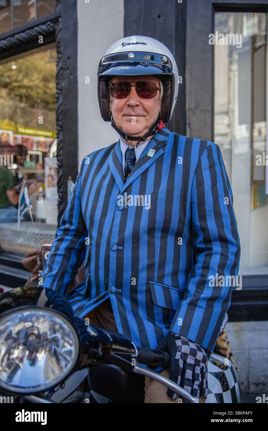 London, UK. 03rd May, 2025. A Mod pose's for a photograph whilst ...