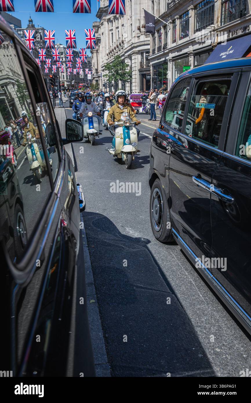 London, UK. 03rd May, 2025. Mods riding classic scooters ride through ...
