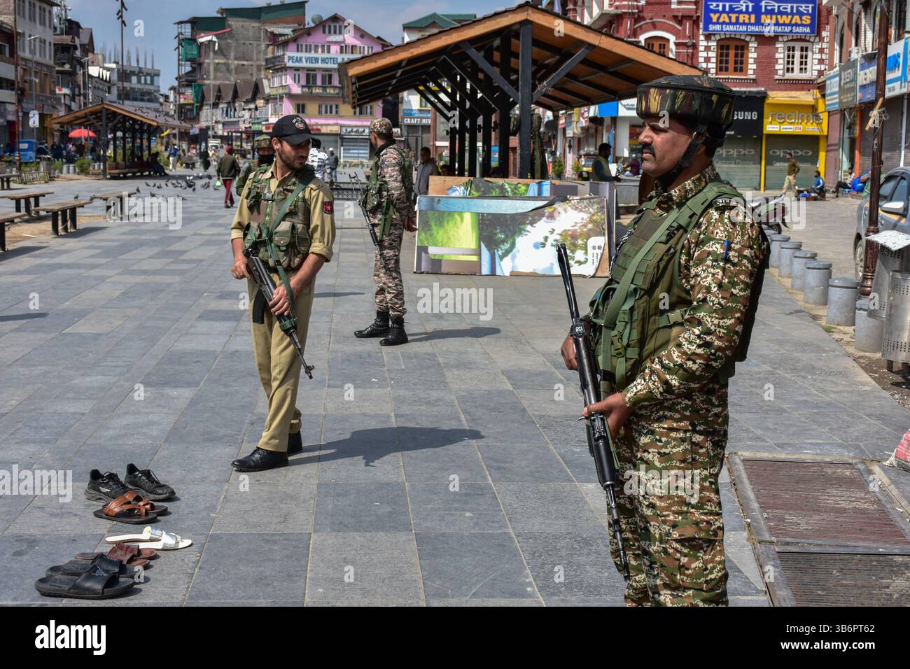 Indian paramilitary troopers stand alert in Srinagar, the summer ...