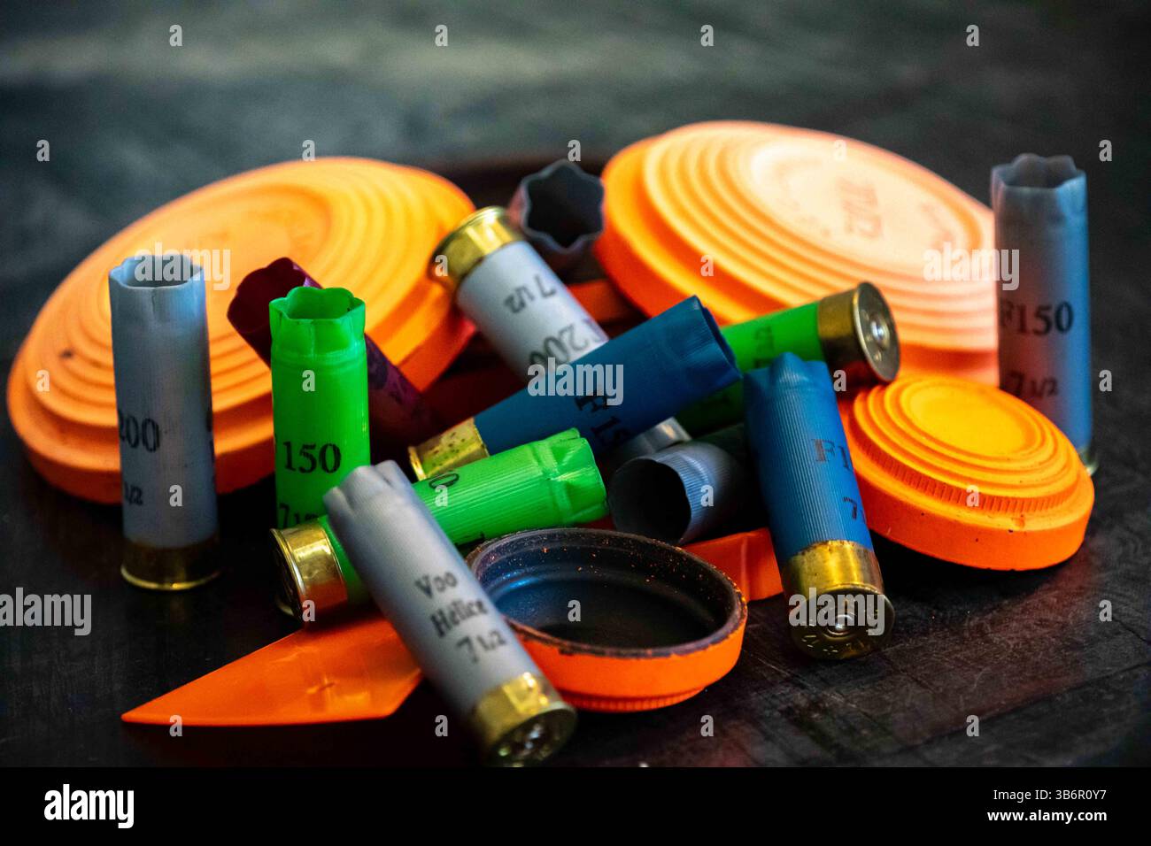 objects from the Olympic sports skeet shooting with a 12 gauge shotgun ...