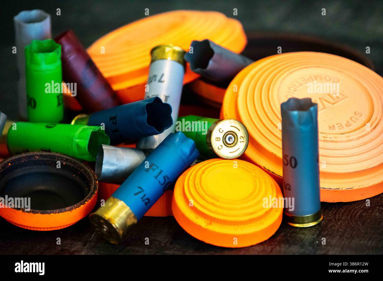 objects from the Olympic sports skeet shooting with a 12 gauge shotgun ...