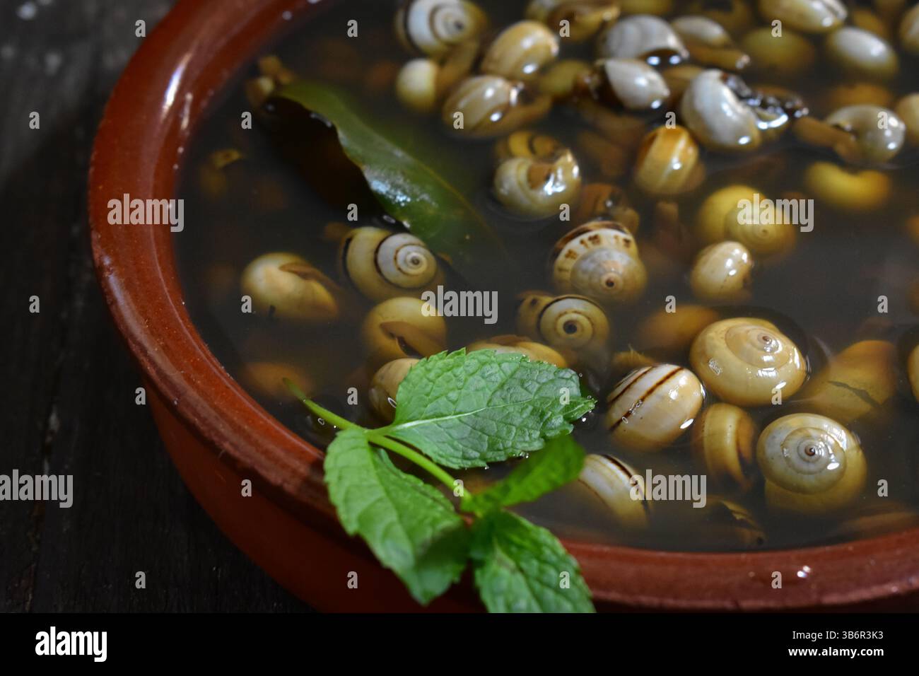 Spanish Tapas Snails Food Background Stock Photo - Alamy