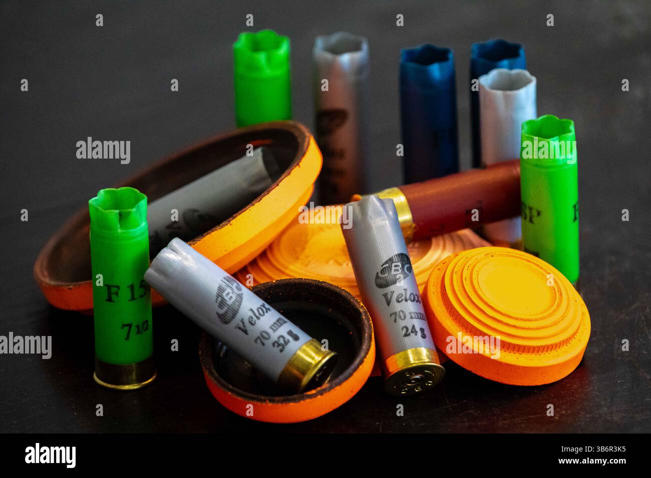 objects from the Olympic sports skeet shooting with a 12 gauge shotgun ...