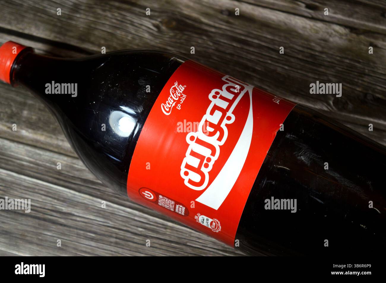 Cairo, Egypt, April 2 2025: Translation of Arabic on the bottle, (Coca ...