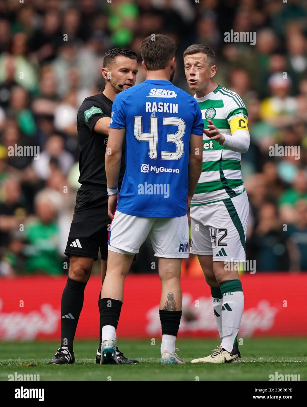 Referee Nick Walsh speaks with Rangers' Nicolas Raskin and Celtic's ...