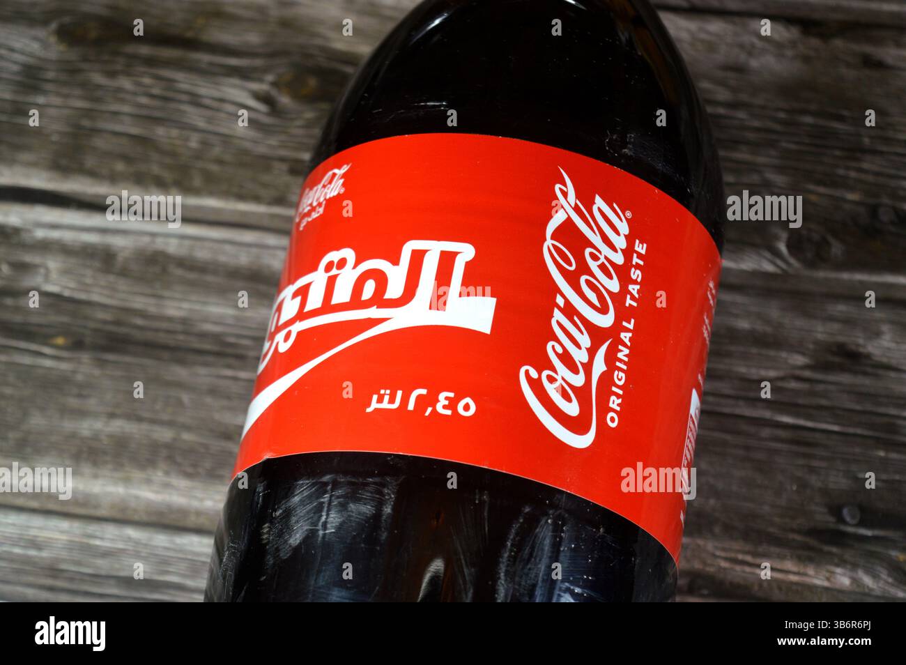 Cairo, Egypt, April 2 2025: Translation of Arabic on the bottle, (Coca ...