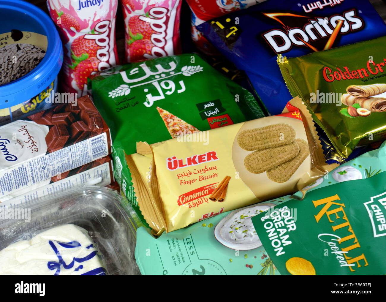 Cairo, Egypt, March 20 2025: Big chips, Juhayna yogurt mix, Ulker ...