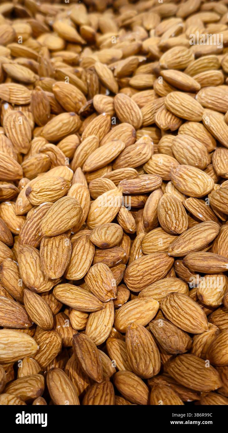 Almonds on the counter in the supermarket. Prepared for sale. Healthy ...
