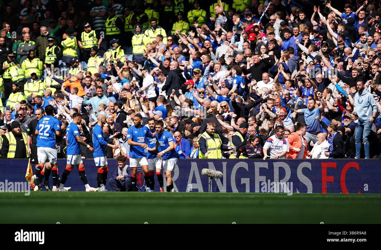 Rangers' Nicolas Raskin (right) celebrates with team-mates before his ...