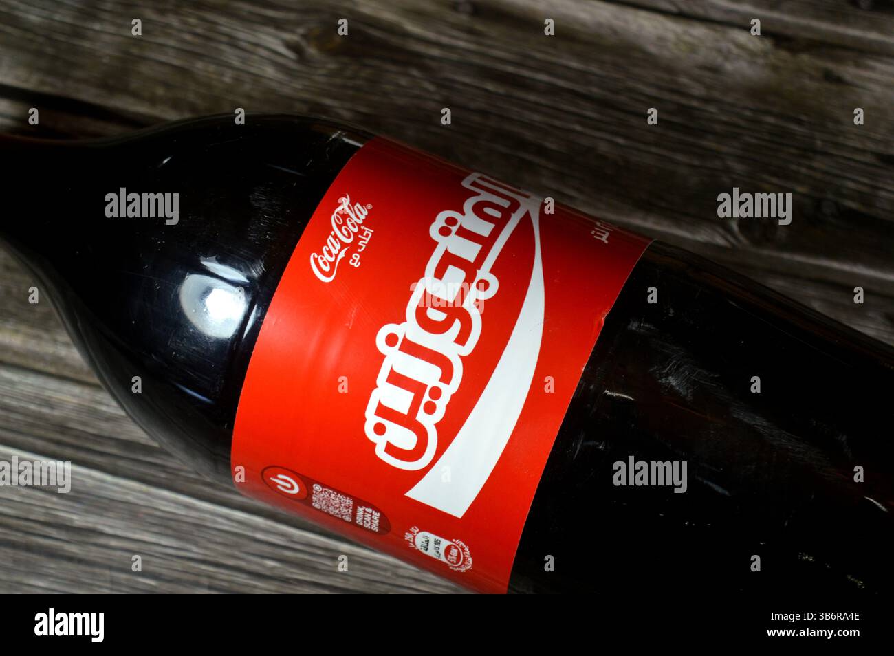 Cairo, Egypt, April 2 2025: Translation of Arabic on the bottle, (Coca ...