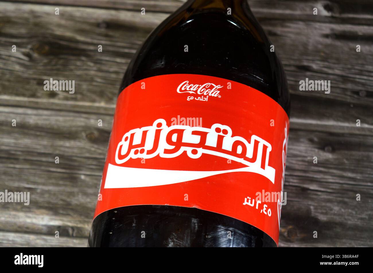 Cairo, Egypt, April 2 2025: Translation of Arabic on the bottle, (Coca ...