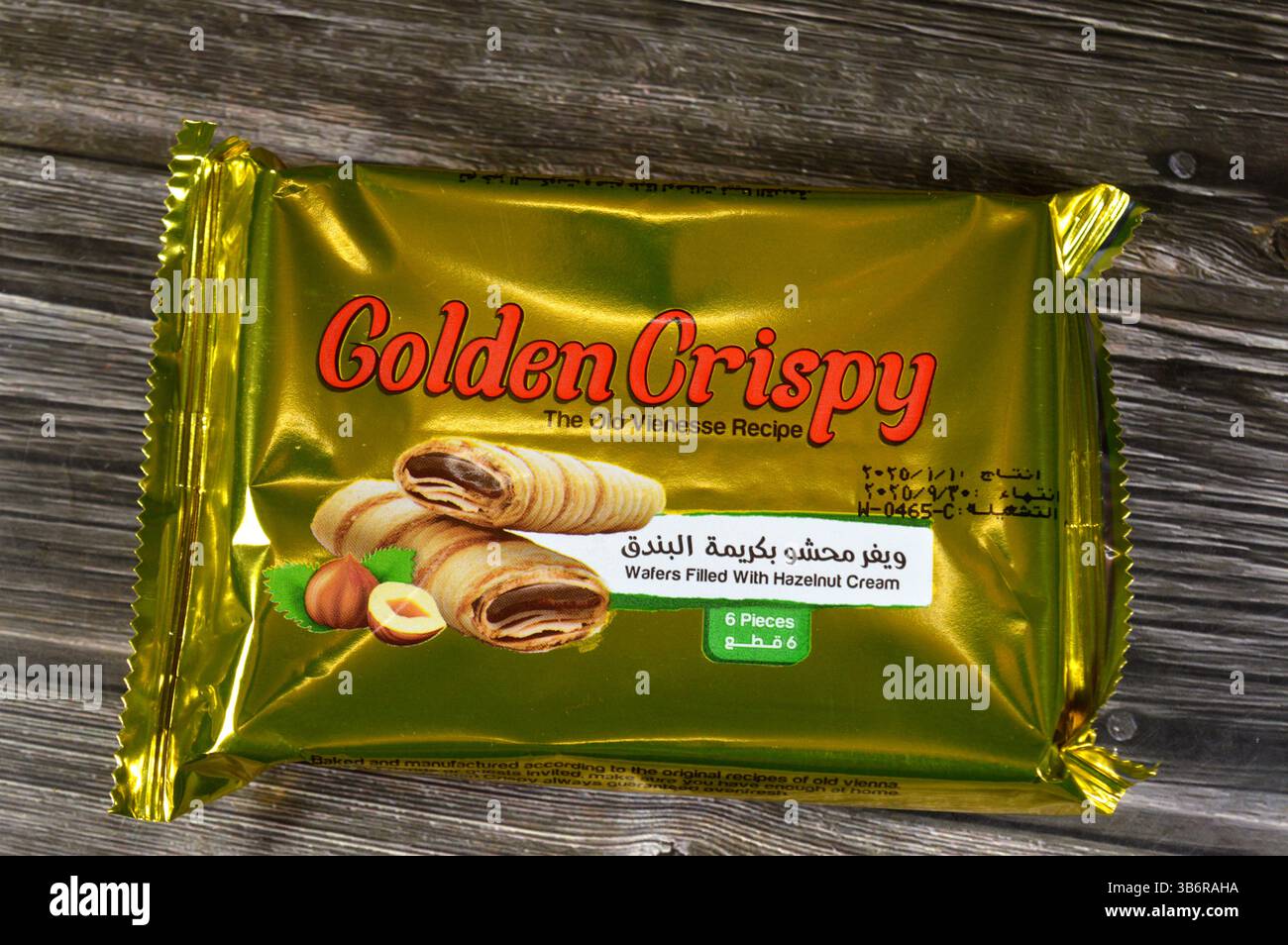 Cairo, Egypt, March 20 2025: Golden crispy wafers filled with hazelnut ...