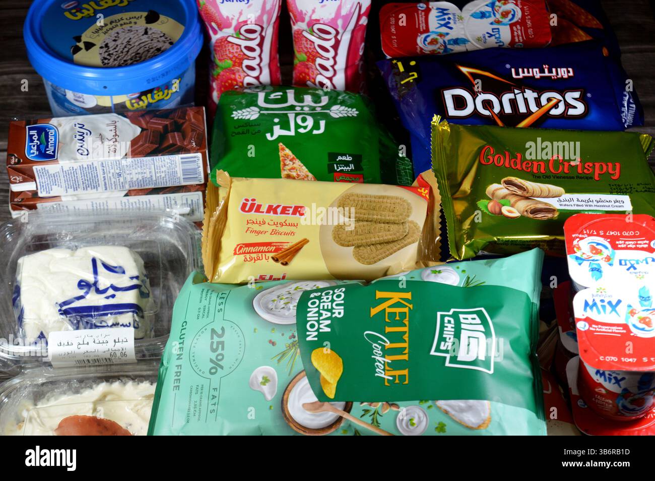 Cairo, Egypt, March 20 2025: Big chips, Juhayna yogurt mix, Ulker ...