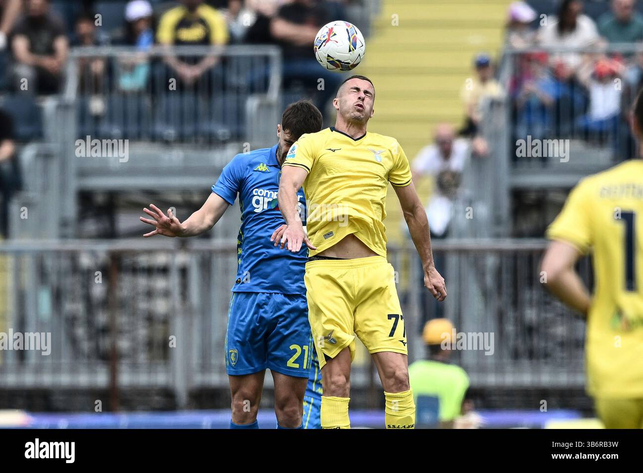 Lazio's Adam Marusic, right, competes for the ball with Empoli's Mattia ...