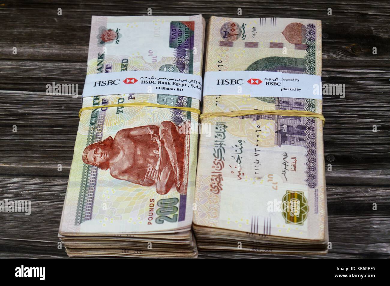 Cairo, Egypt, April 17 2025: HSBC Bank banknote binding tape on Stacks ...