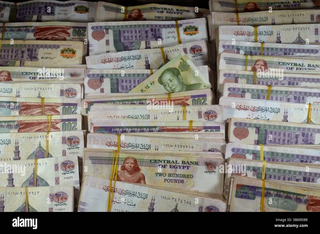 Chinese Yuan cash money bill banknote and Piles and Stacks of Egypt ...