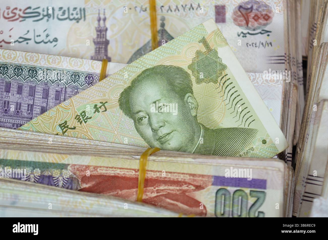 Chinese Yuan cash money bill banknote and Piles and Stacks of Egypt ...