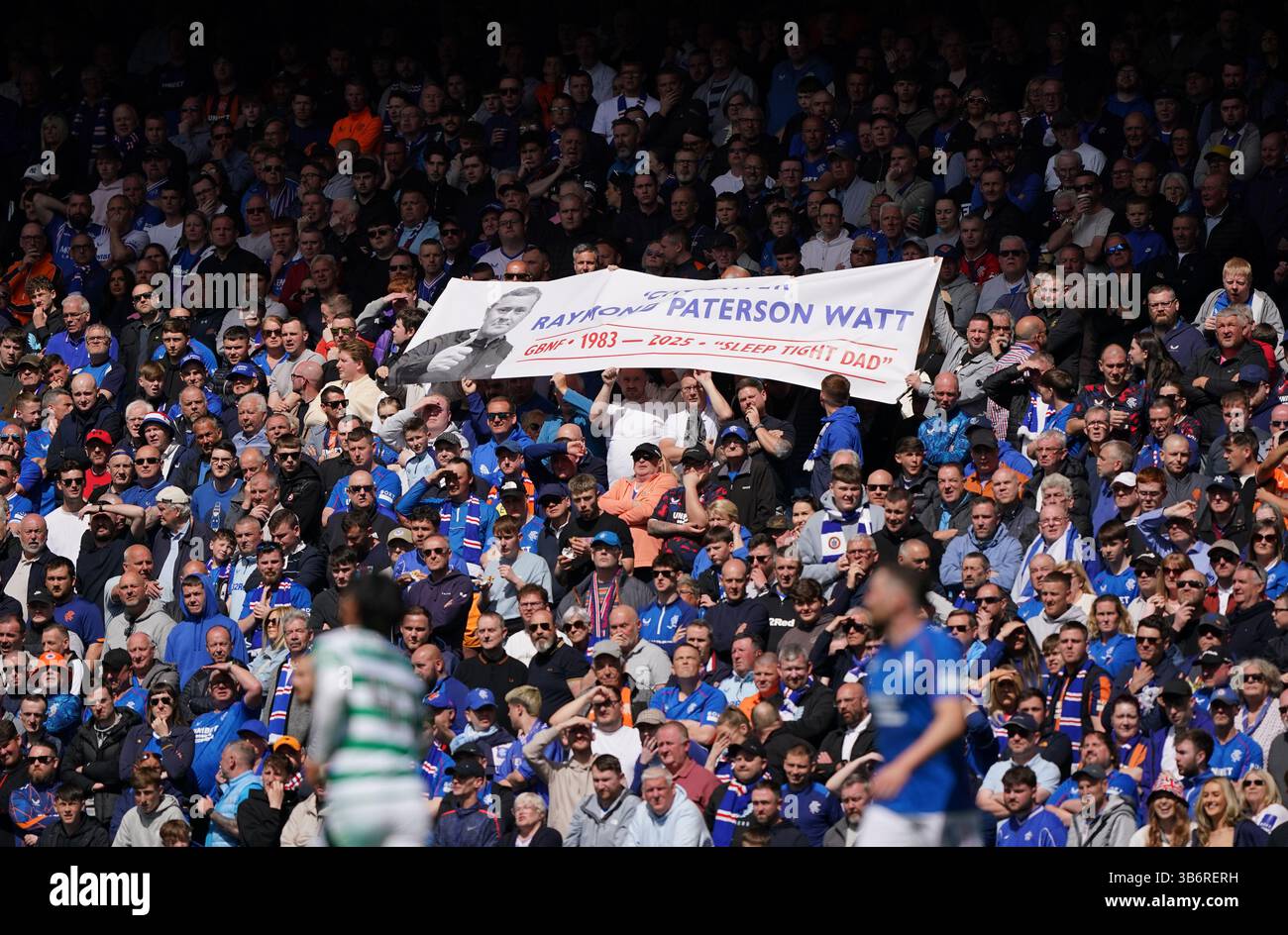 A tribute banner to Rangers fan Raymond Watt Patterson in the stands ...