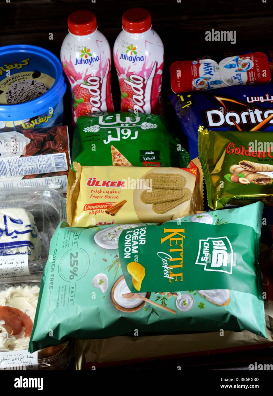 Cairo, Egypt, March 20 2025: Big chips, Juhayna yogurt mix, Ulker ...