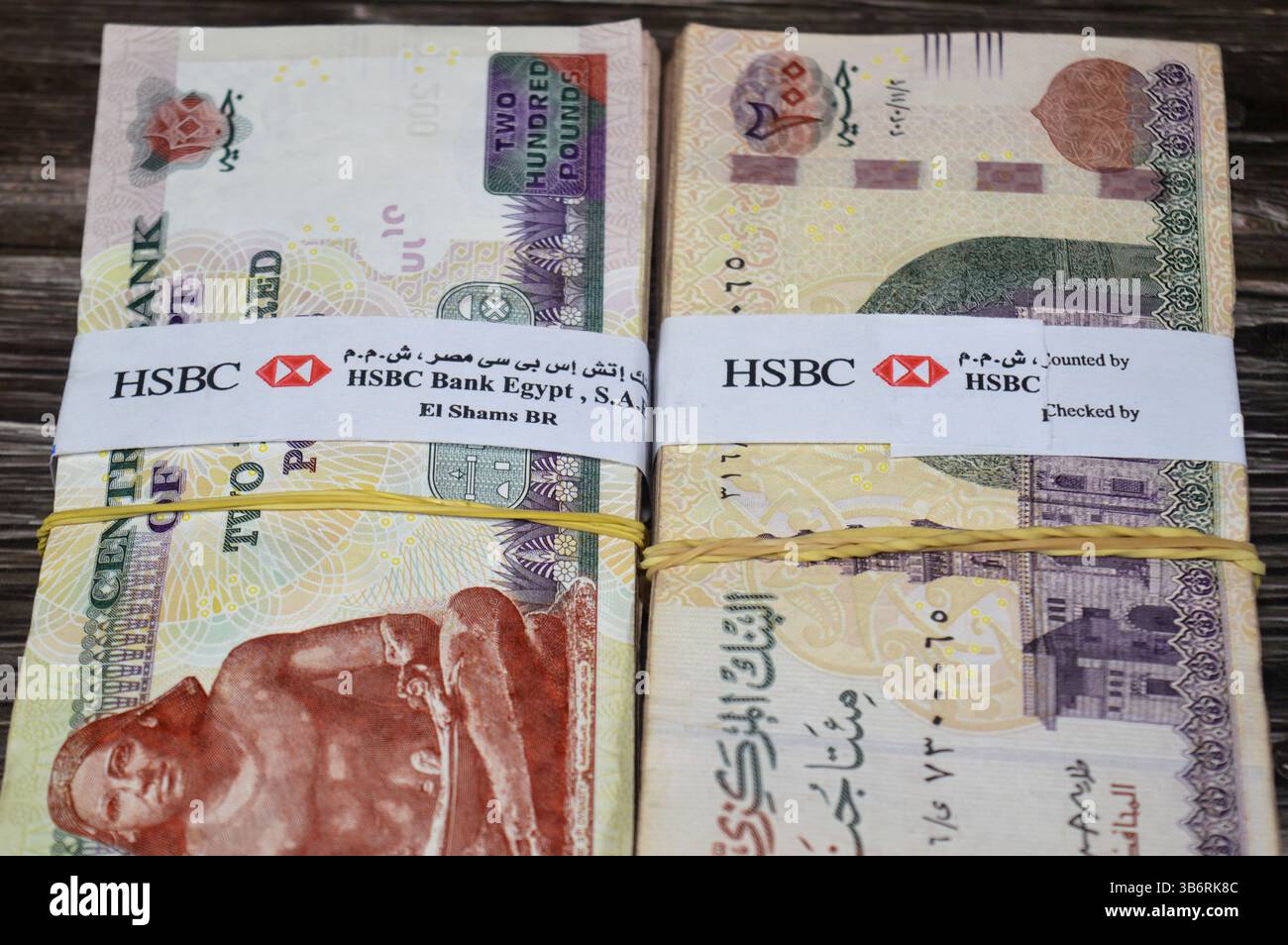 Cairo, Egypt, April 17 2025: HSBC Bank banknote binding tape on Stacks ...