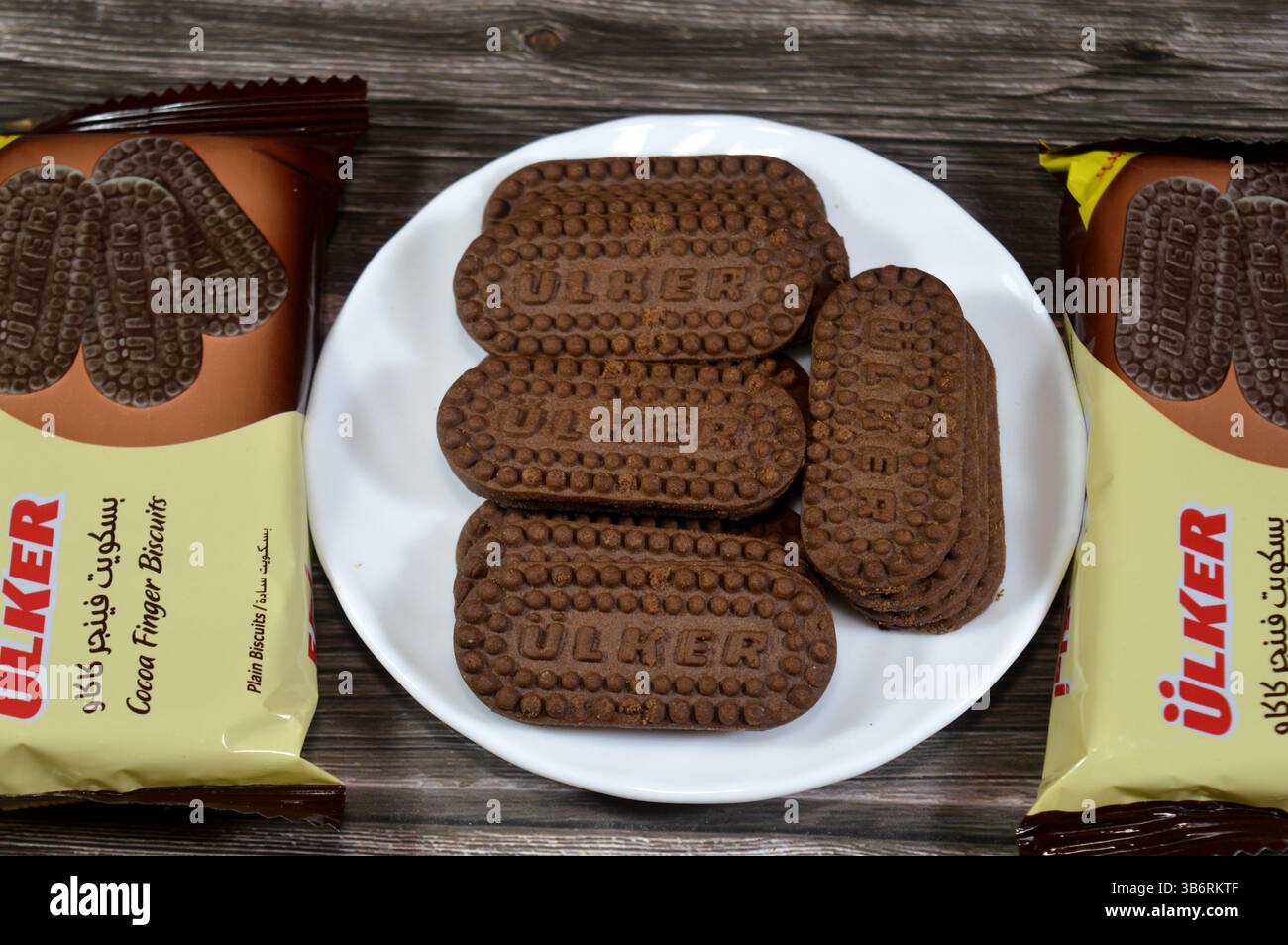Cairo, Egypt, March 15 2025: Ulker Cocoa finger biscuits, plain biscuit ...