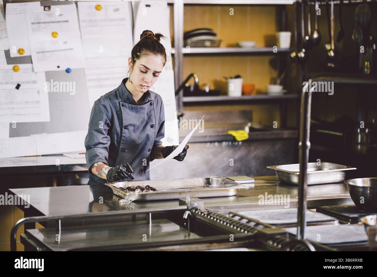 Subject profession and cooking pastry. young Caucasian woman with ...