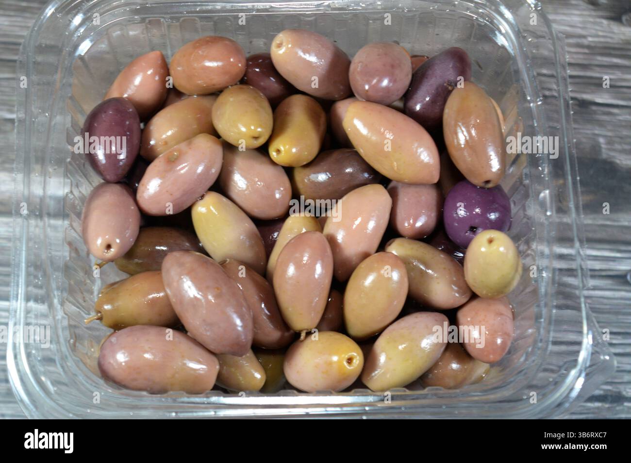 Black Olives (Olea europaea), Kalamata olive is a large, dark purple ...