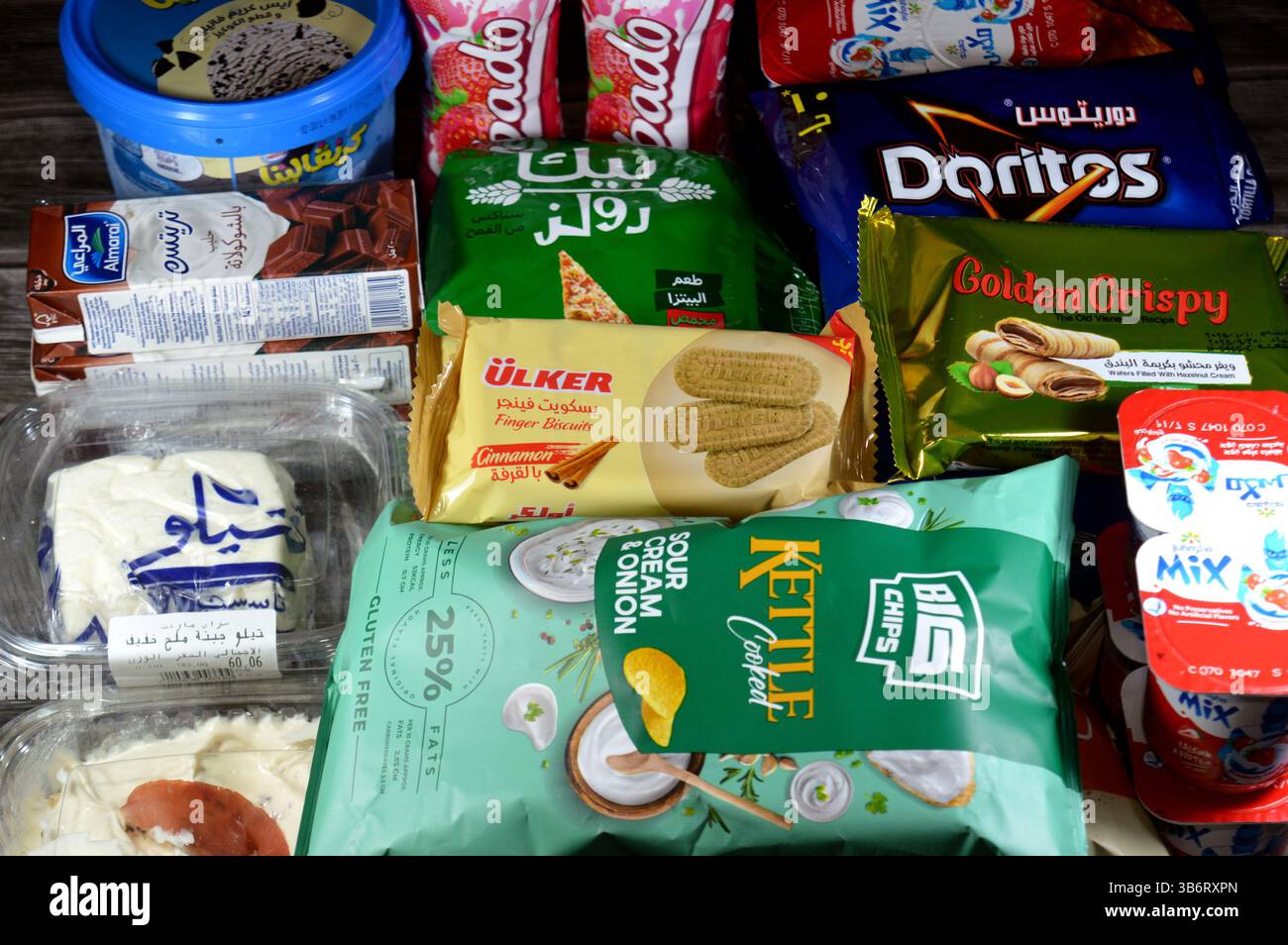 Cairo, Egypt, March 20 2025: Big chips, Juhayna yogurt mix, Ulker ...