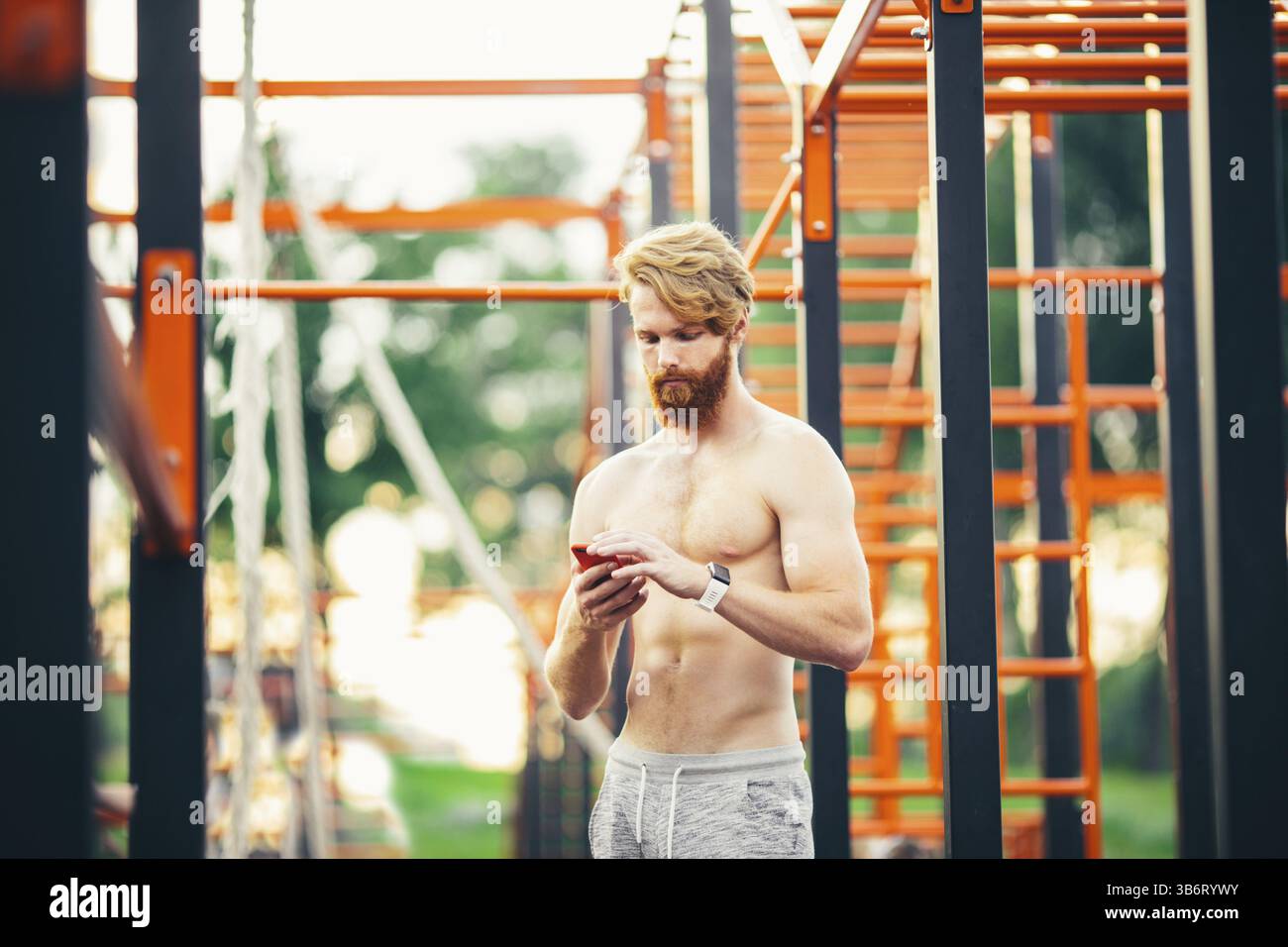 Male athlete examining fitness hi-res stock photography and images - Alamy