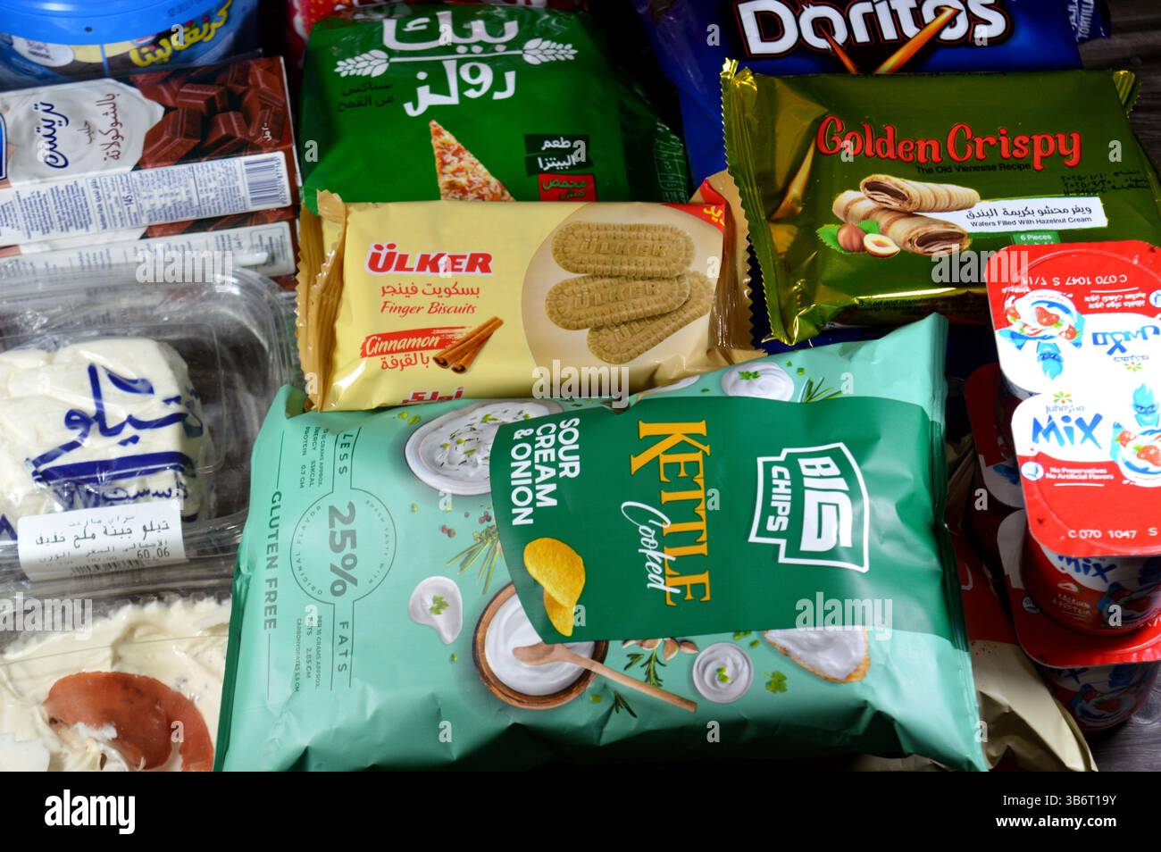 Cairo, Egypt, March 20 2025: Big chips, Juhayna yogurt mix, Ulker ...