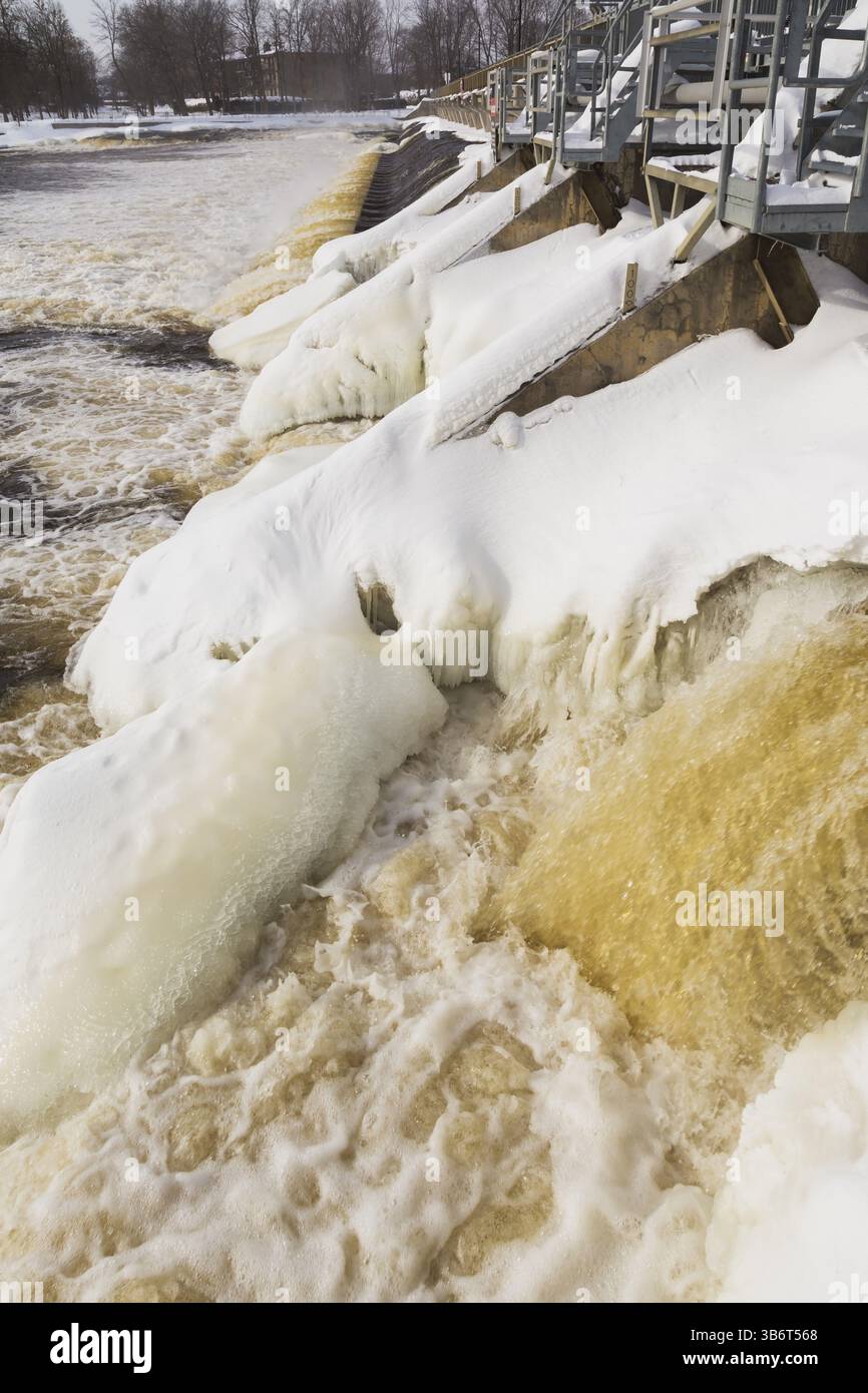 Water flowing through water control gates and Hydraulic Jumps at base ...