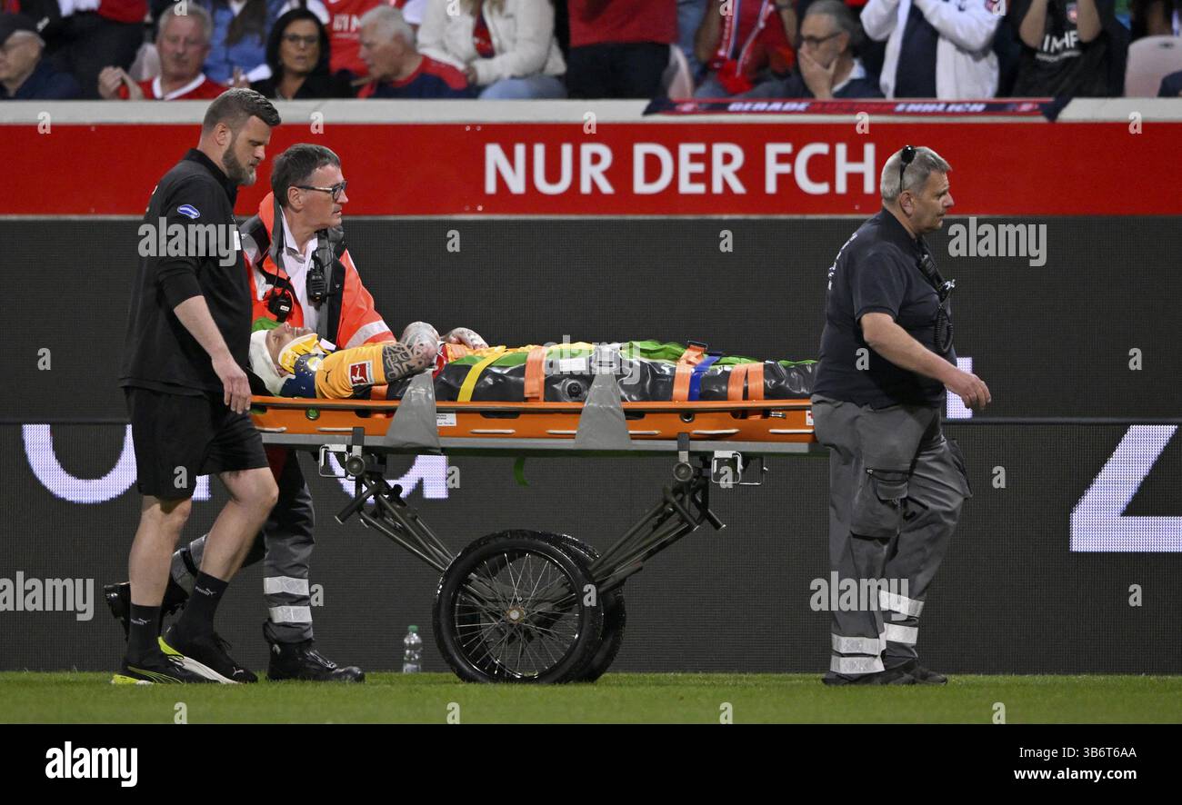 Goalkeeper Kevin Mueller 1. FC Heidenheim 1846 FCH (01) is stretchered ...